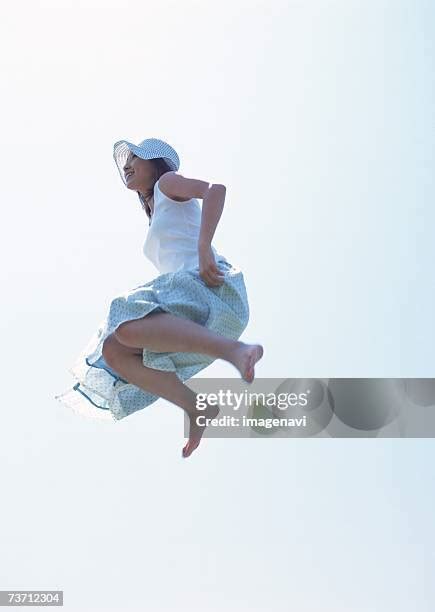 Lady Jumping Skirt Photos And Premium High Res Pictures Getty Images
