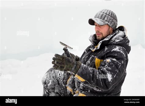 Worker With A Chisel In His Hand At A Construction Site Stock Photo Alamy