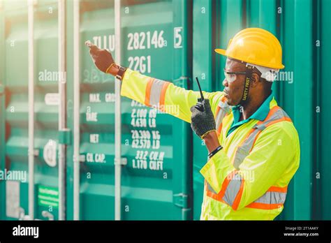 Worker Control Loading Containers Cargo At Port Shipyard With Green Color Container Box For Eco