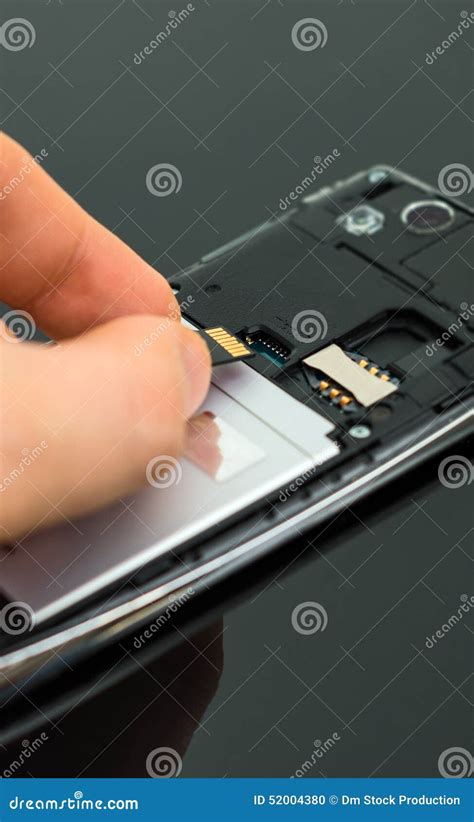 Male Hand Inserting Micro SD Card Stock Photo Image Of Closeup Detail 52004380