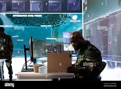 Army Crew Officer In A Control Center Oversees Satellite Data And Missions Details Providing