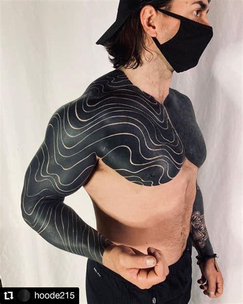 Negative Space Blackout Tattoo