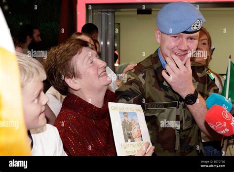 Chrissie Renehan Greets Her Grandson Jack Renehan At Dublin Airport As Irish Troops Return