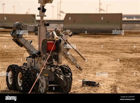 A Remotec Andros F6a Robot Is Seen Approaching A Dji Mavic Air 2 Unmanned Aerial System During A