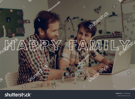 Father Son Programming Robot On Laptop Stock Photo 1213709284 Shutterstock