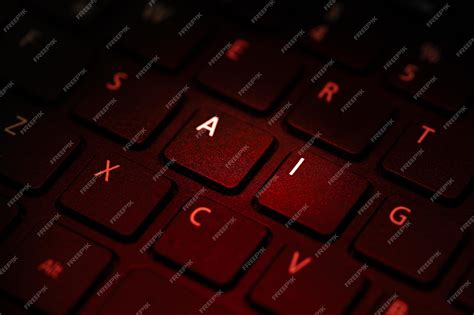 Premium Photo Keyboard Being Illuminated With Red Light Highlighting Letters A I Close Up On
