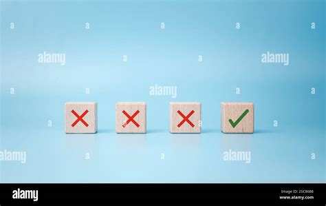 Checkbox With Green Check Mark From Row Of Multiple Boxes With Red Crosses On Blue Background