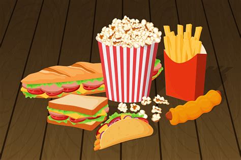 패스트 푸드 세트 패스트 푸드 나무 테이블에 누워 있습니다 Shawarma 핫도그 피자 샌드위치 팝콘 아이스크림 날개 허벅지 및