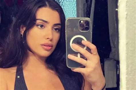 Bianca Censori Steps Out Seemingly Topless Under See Through Raincoat