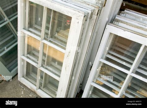 Windows Stacked Outside Of An Antiques Store Stock Photo Alamy