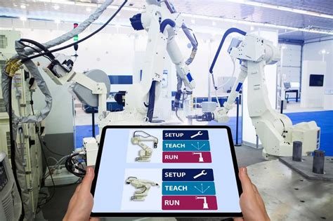 Engineer With Teach Pendant Device Stock Image Image Of Factory