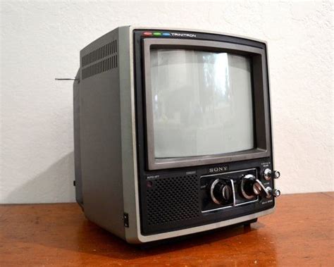 Vintage Crt Tv On Wooden Table