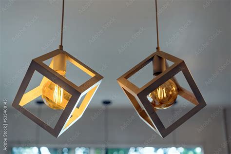 Deteriorated Bulb Give The Dimmed Light Much Darker Than Normal Bulbs On The Lamps Hanging From