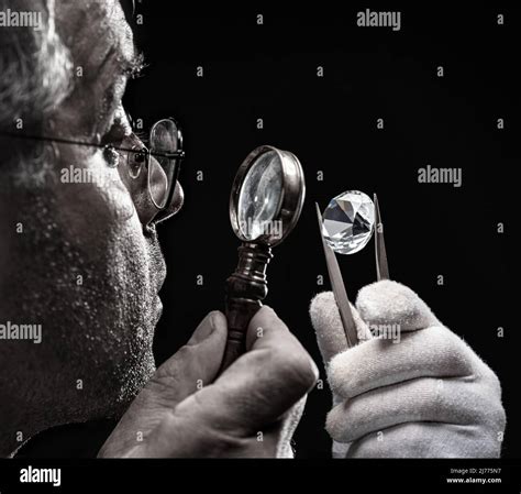 Large Gemstone In Jeweler S Hand Close Up Gem Identifying And Evaluating Process Stock Photo