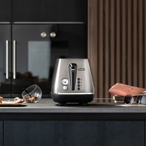 Тостер DeLonghi CTIN 2103 TB Distinta Titanium - купить в магазине ...