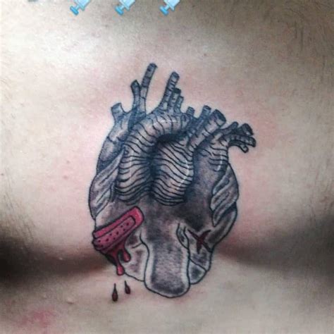 Bleeding Heart Tattoo Designs Symbolism And Style