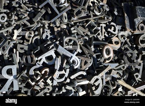 Full Bleed Background Image Showing Random Cast Metal Letters And