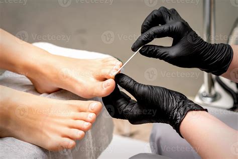 File Toenails With Nail File Stock Photo At Vecteezy