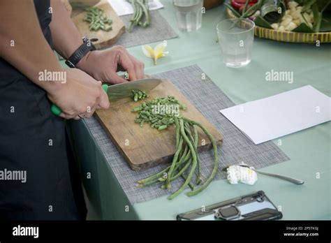 Adult Students Learning Recipe And Preparing Meal In Cooking Class Stock Photo Alamy