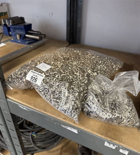 Two Sealed Bags Of Small Fabric Eyelets Badgers Auctions