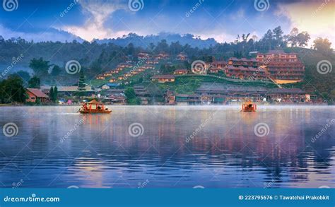 Tourists Take A Boat At Ban Rak Thai Village In Mae Hong Son Province