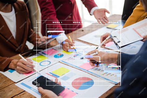 Premium Photo Project Manager Working And Update Tasks With Milestones Progress Planning And