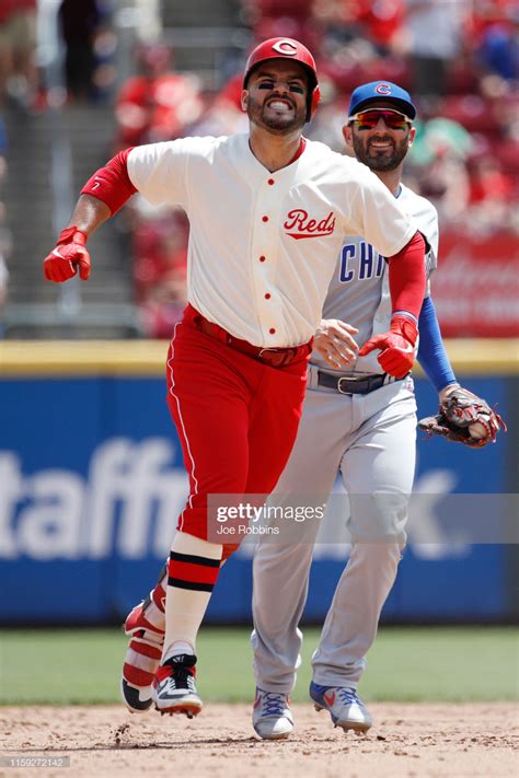 Eugenio Suarez Of The Cincinnati Reds Reacts After Sliding Past Cincinnati Reds Cincinnati