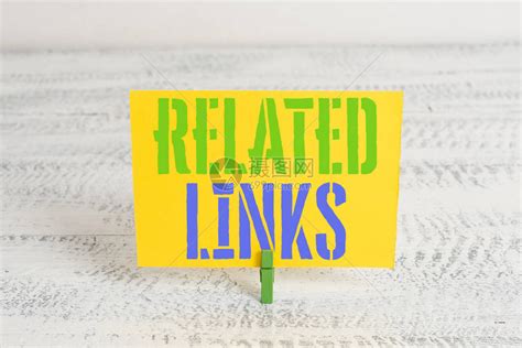 显示相关链接的文本符号商业照片展示网页内的网站交叉引用热链接超链接绿色衣夹白色木背景彩色纸高清图片下载 正版图片503990849 摄图网