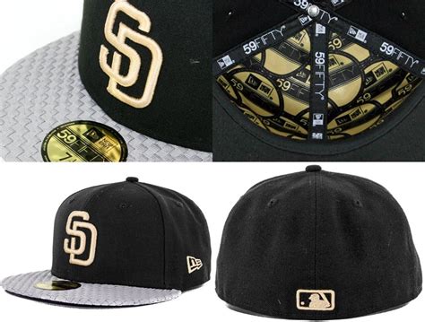 The San Diego Padres Woven Visor Is A Black Hat With A Cream Colored