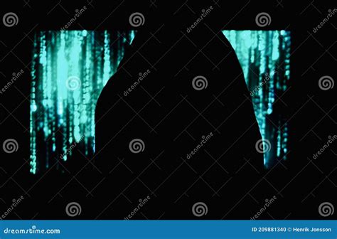 Hooded Hacker Sitting In Front Of A Computer Screen With Green Code