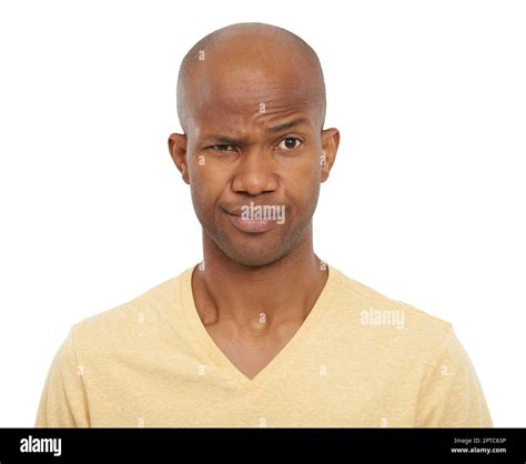 Hes Not Easily Impressed An African American Man Smirking At The