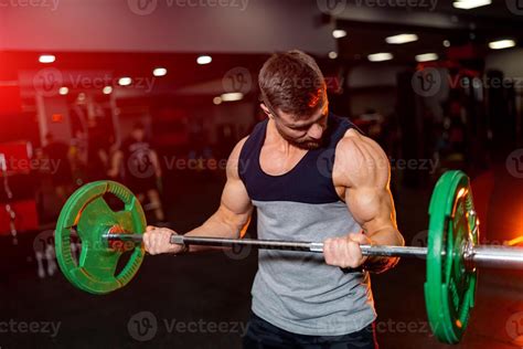 Strong Muscle Male Lifting Big Weights Sporty Fitness Man Working Out