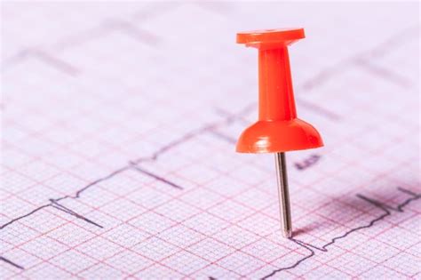 Premium Photo Red Push Pin