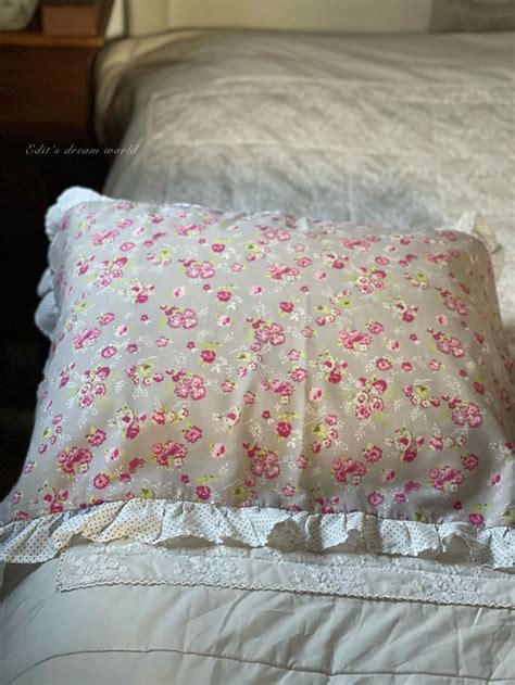 Pink And Yellow Flowered Pillowcases For A Cozy Bedroom