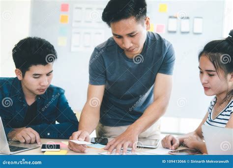 Programmer And Web Designer Ux Ui Meeting For Planing Mobile Ap Stock