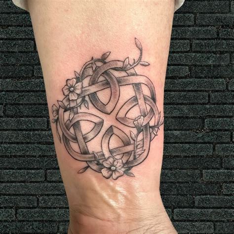 Get Tangled In These 20 Incredible Celtic Knot Tattoos