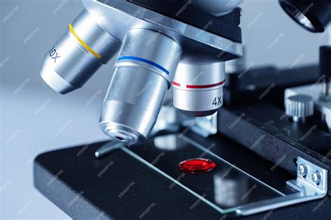 Premium Photo Blood Sample On A Glass Slide Under A Microscope In The