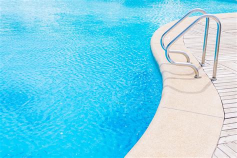 Download Enjoy The Refreshing Waters Of A Sparkling Backyard Swimming