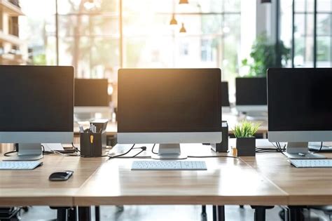 Hightech Office Space With Multiple Screens Premium Ai Generated Image