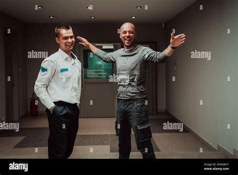 Security Guard Making Body Searching Procedure On Man For Finding Hidden Objects Before Entering