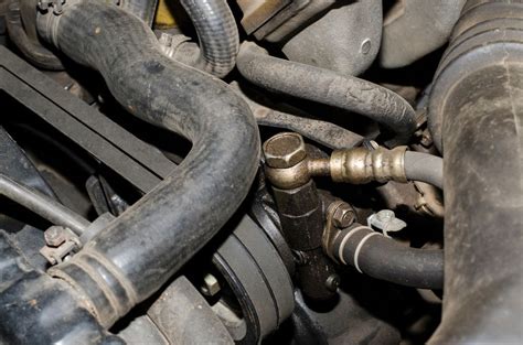 Why Does My Car Backfire Through the Exhaust? Causes and Solutions