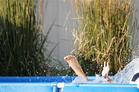 Premium Photo Low Section Of Person Falling In Wadding Pool