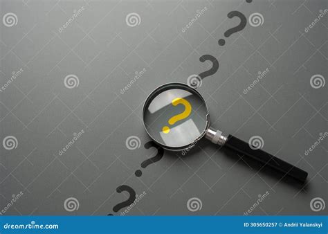 Magnifying Glass And Yellow Question Mark Faq Royalty Free Stock