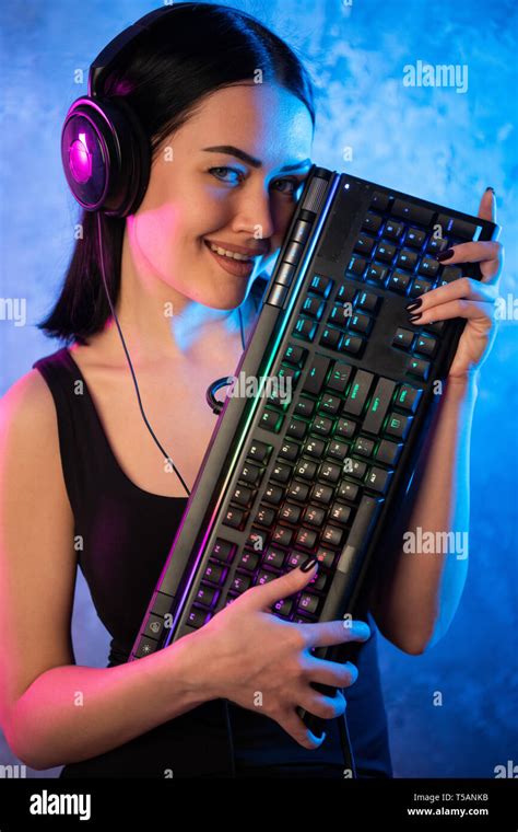 Funny Nerd Gamer Girl Posing With Gaming Keyboard Playing Computer