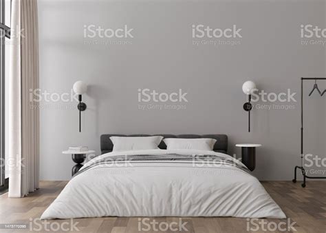 인테리어 모형 로프트 스타일 현대적인 침실의 빈 벽 아트웍 사진 포스터를위한 공간을 복사하십시오 현대적인 스타일의 인테리어 디자인 침대가 있는 아파트 또는 호텔 객실 3d