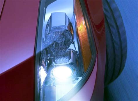 2006 Cadillac Xlr V Press Photos Exterior 008 Headlight Cluster