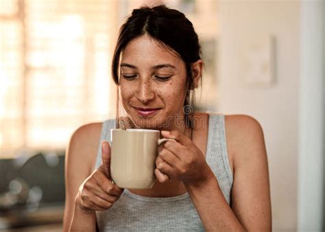 Mmm Smells Like A Good Morning A Young Woman Enjoying A Cup Of