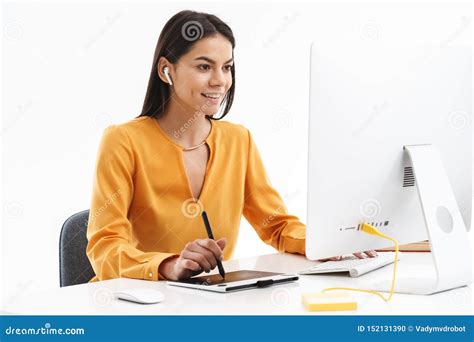 Portrait Of Beautiful Young Designer Woman Using Graphic Tablet Computer And Stylus Pen In