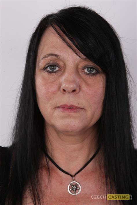 Older Brunette Eva Takes Off Her Clothing And Boots To Get Completely