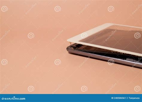 A Broken Tablet With A Swollen Battery And A Dirty Screen Stock Image CartoonDealer Com